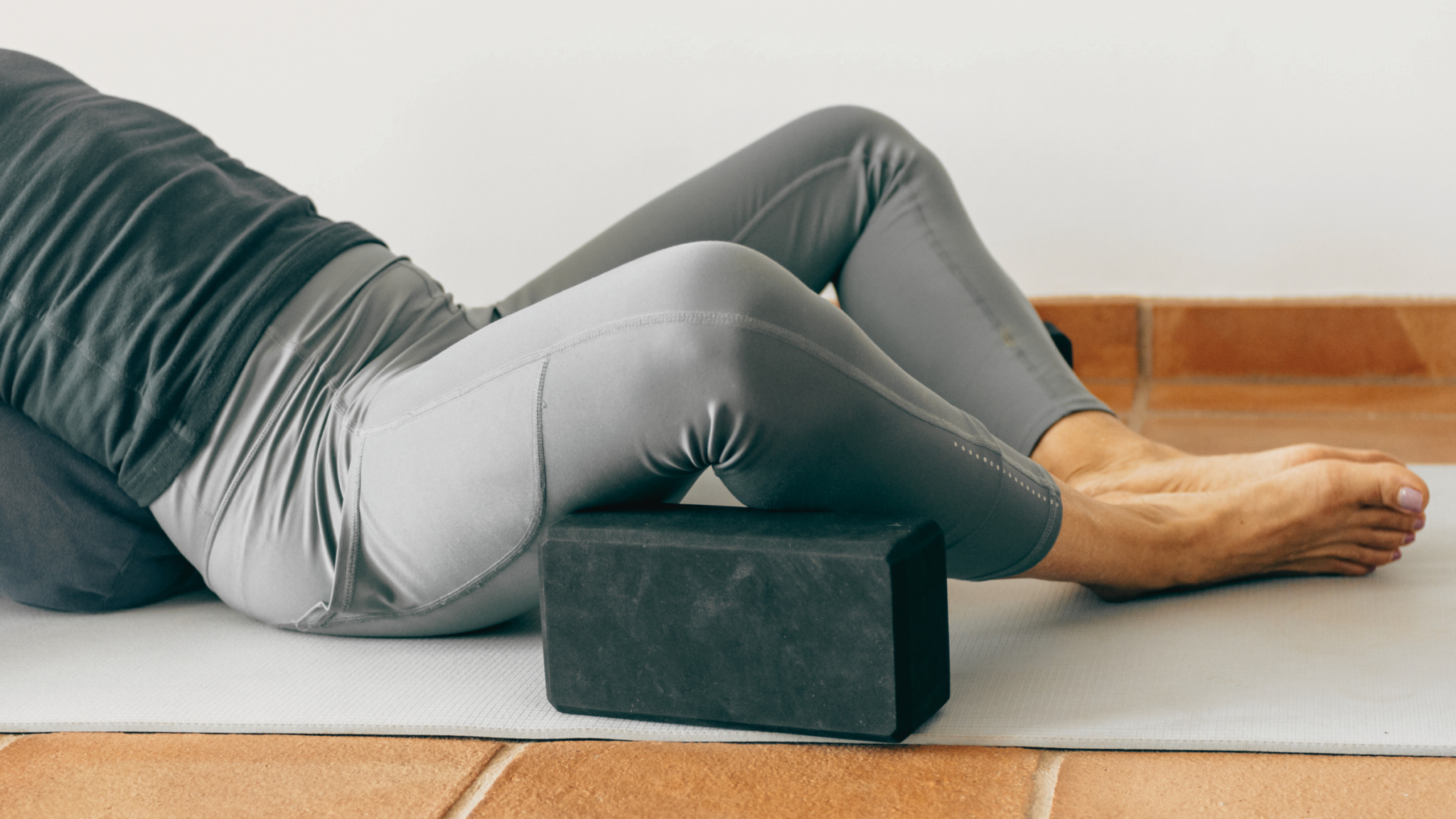 5 Unexpected Benefits of Blocks and Bolsters | Yoganomy